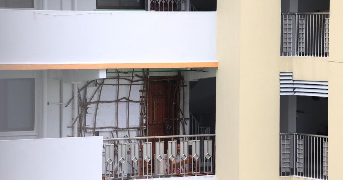Man Builds "Protective Frame" around HDB Unit, Harasses Neighbours with ...